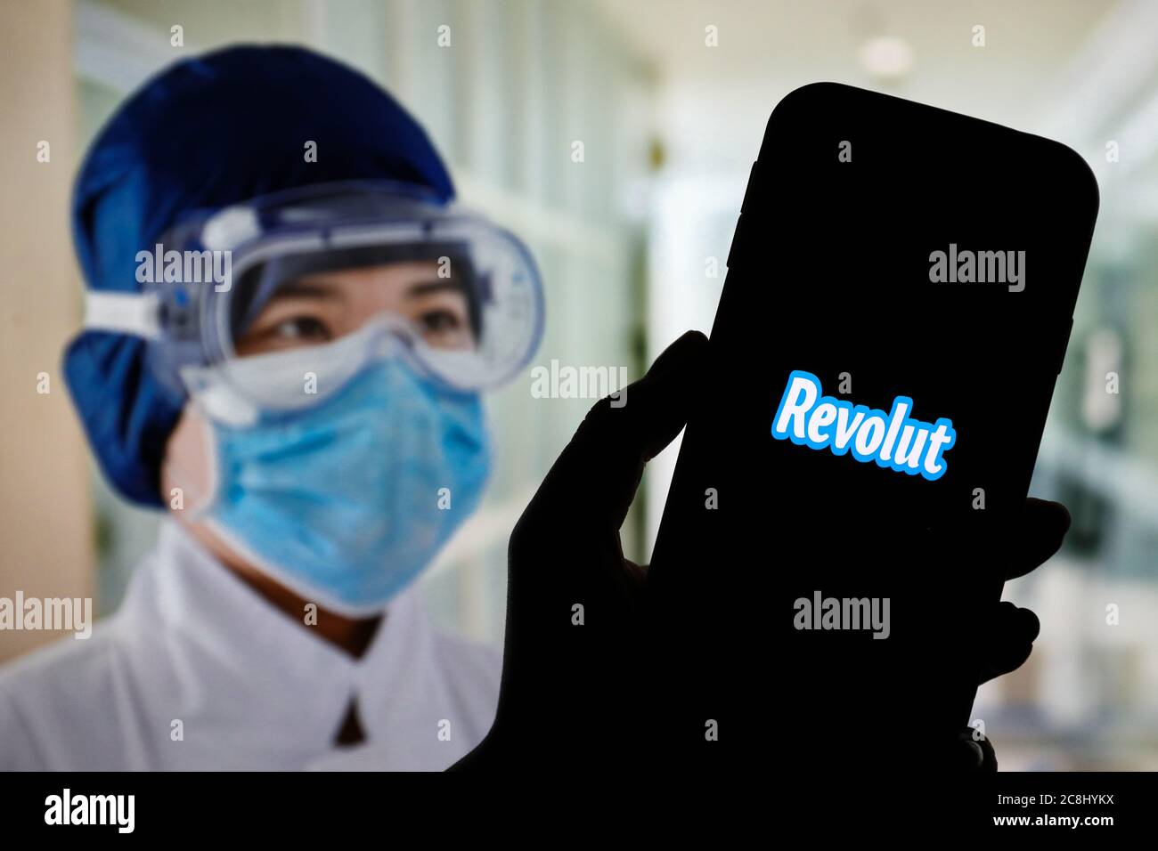 In this photo illustration a Revolut app logo seen displayed on a ...