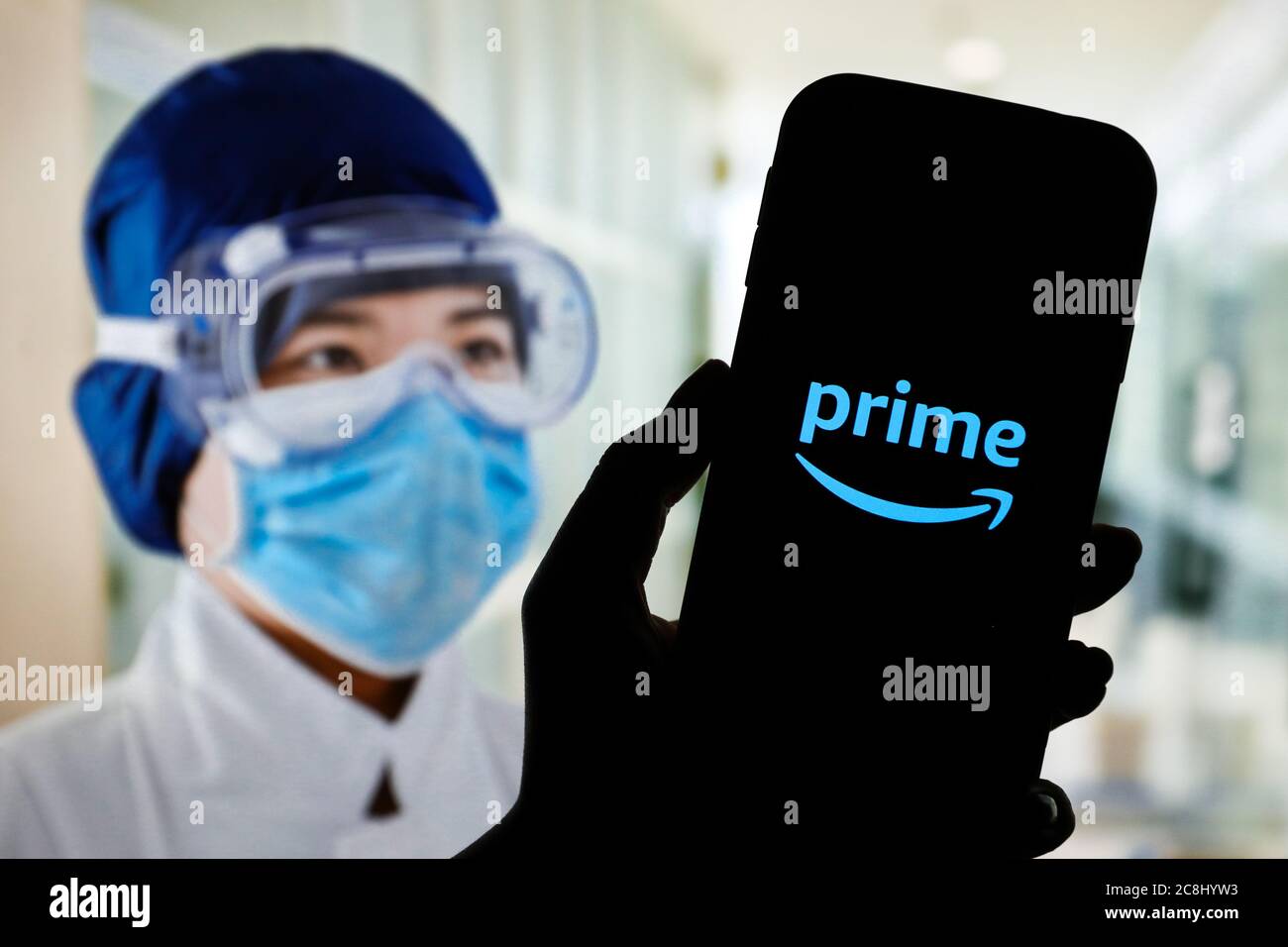 In this photo illustration an Amazon Prime logo seen displayed on a ...