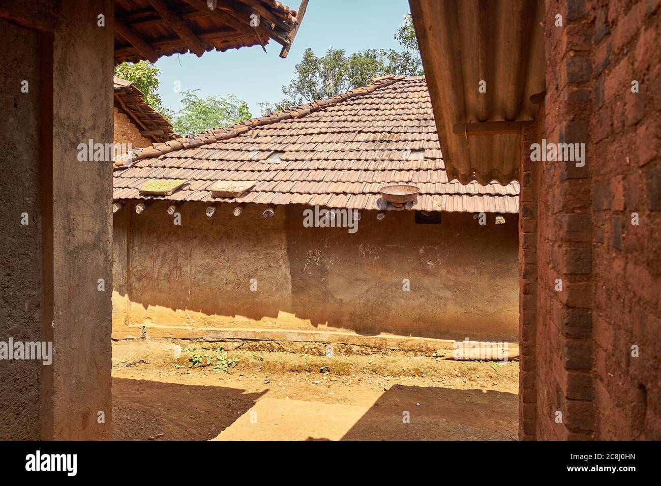 View between two houses in rural Maharashtra. Note the traditional ...