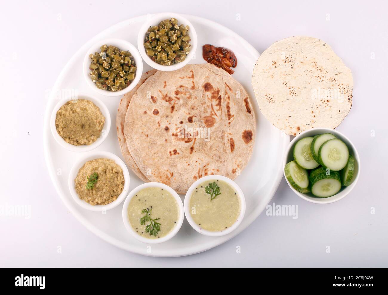 Indian or Hindu Veg Thali or Restaurant style complete Food platter for ...