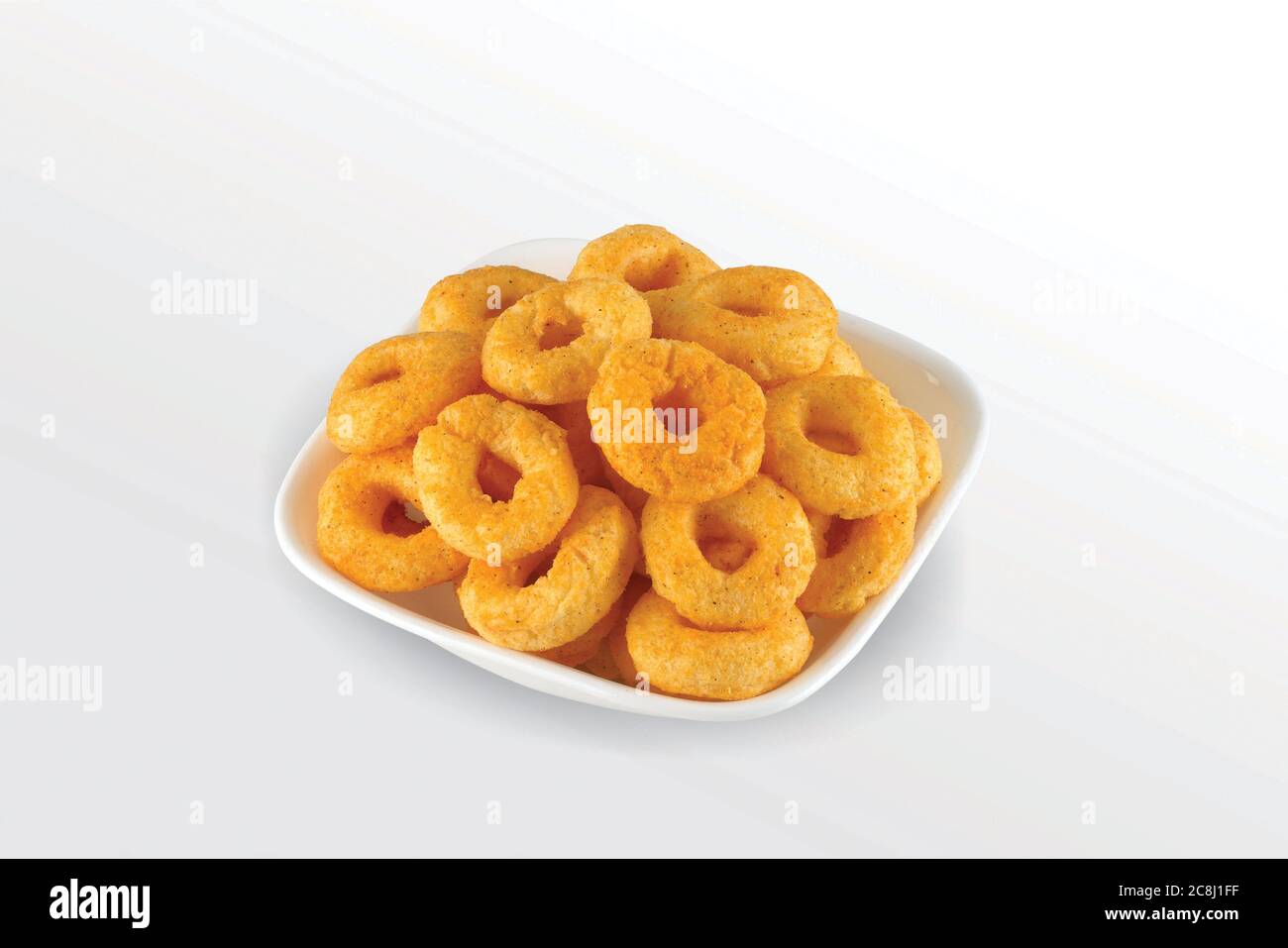 Pile of crispy Corn ring, Cream & Onion snack (Fryums - Frymus) in ...