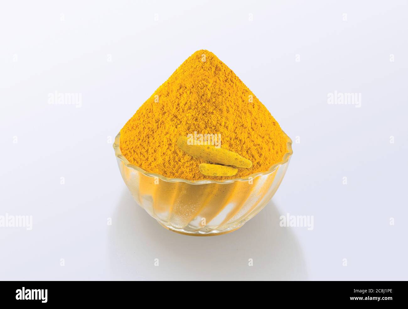 Indian spice - Turmeric Powder (Haldi) in a glass bowl with Turmeric ...