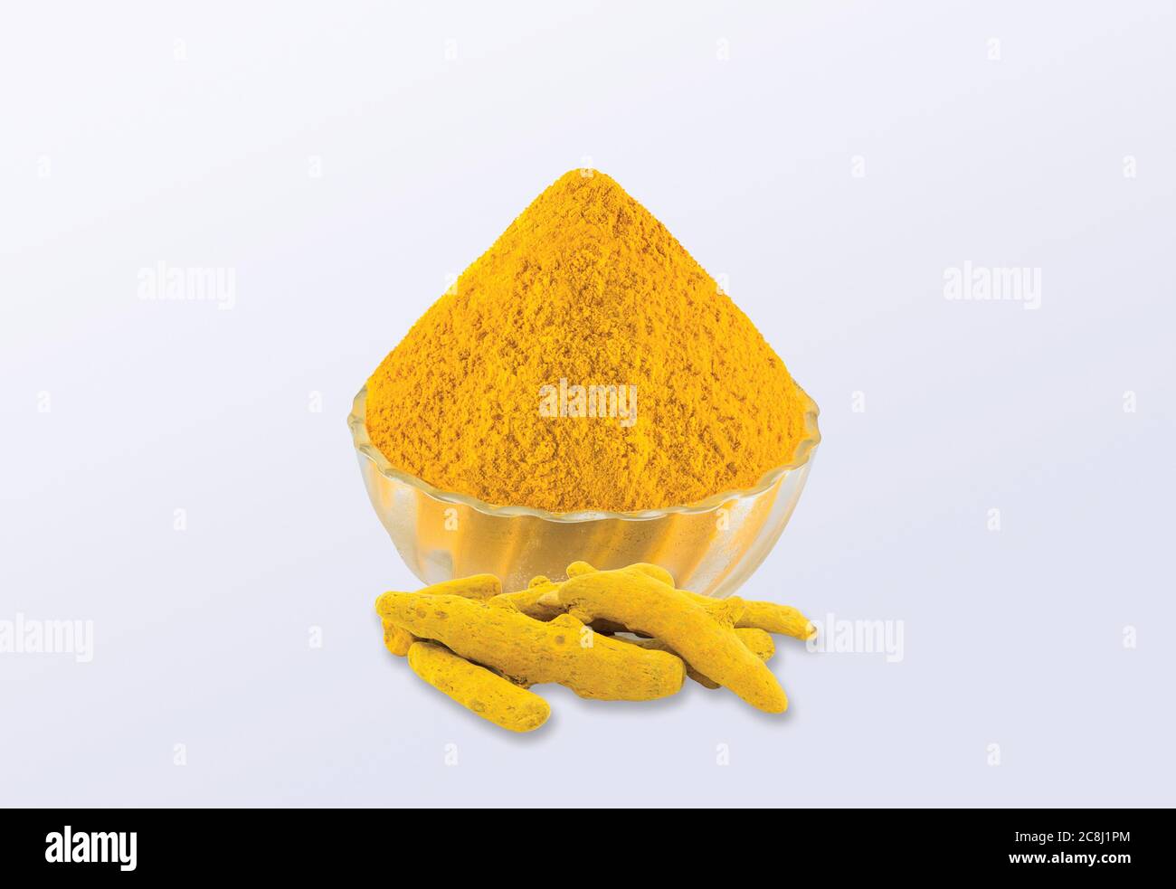 Indian spice - Turmeric Powder (Haldi) in a glass bowl with Turmeric ...