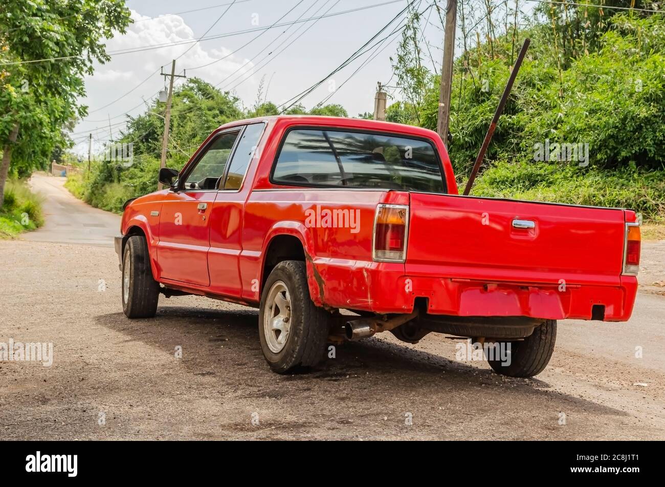 Parked Red Pickup Stock Photo - Alamy
