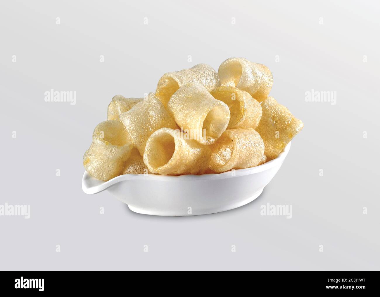 Fried and Spicy Tasty yellow pipe shaped fryums (Papad Pipe) very ...