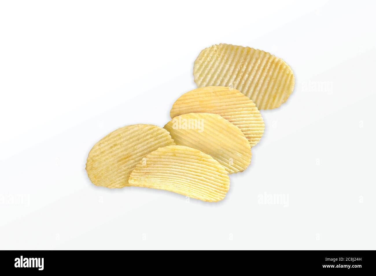 Potato slices turning into chips isolated, Crispy potato chips, salted ...