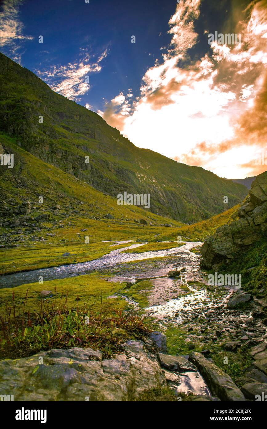 Sunset natural landscape on a trek to Hamta Pass, Pir Panjal range in ...
