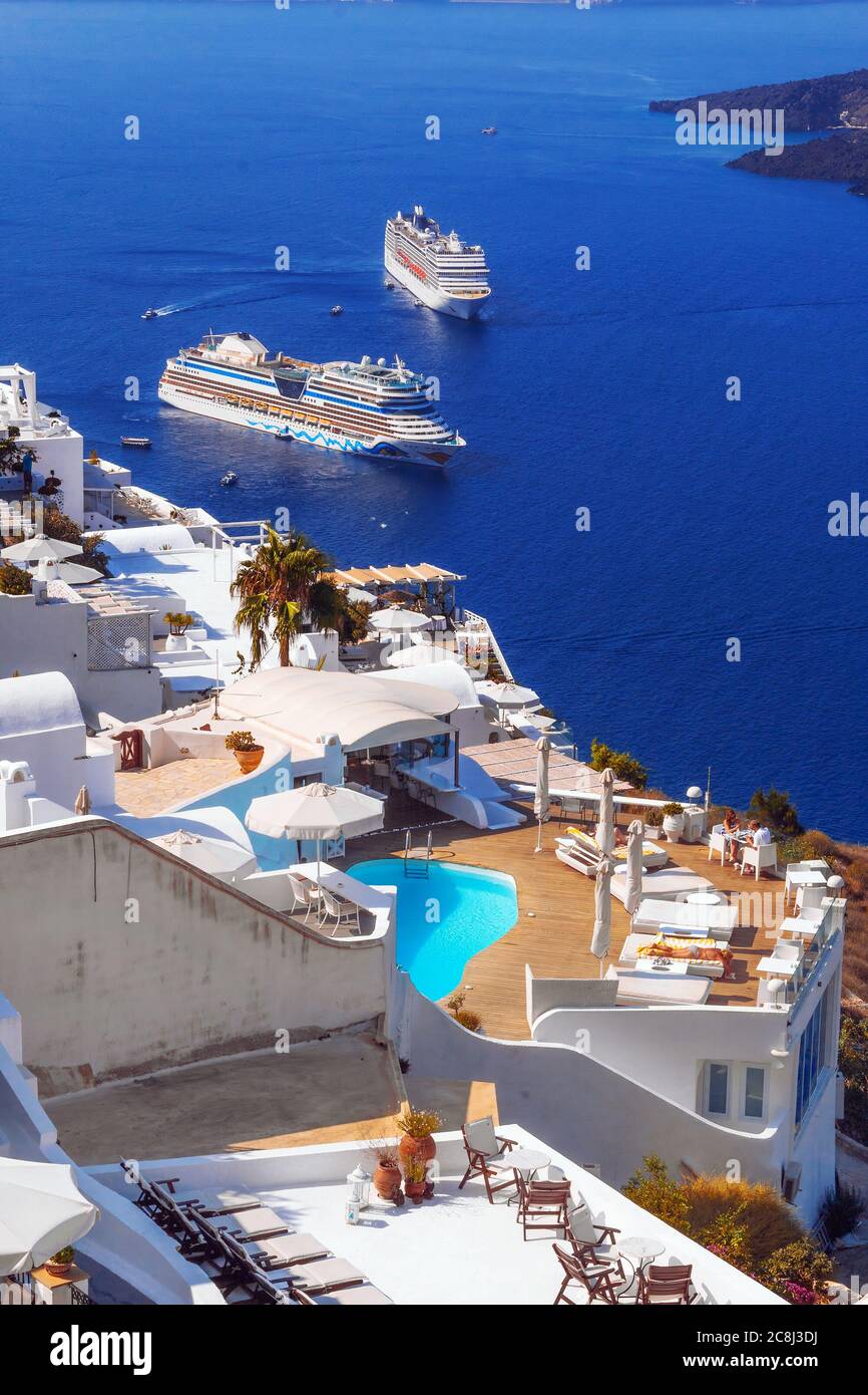 Luxury villas overlooking the caldera in Fira, Santorini Stock Photo ...