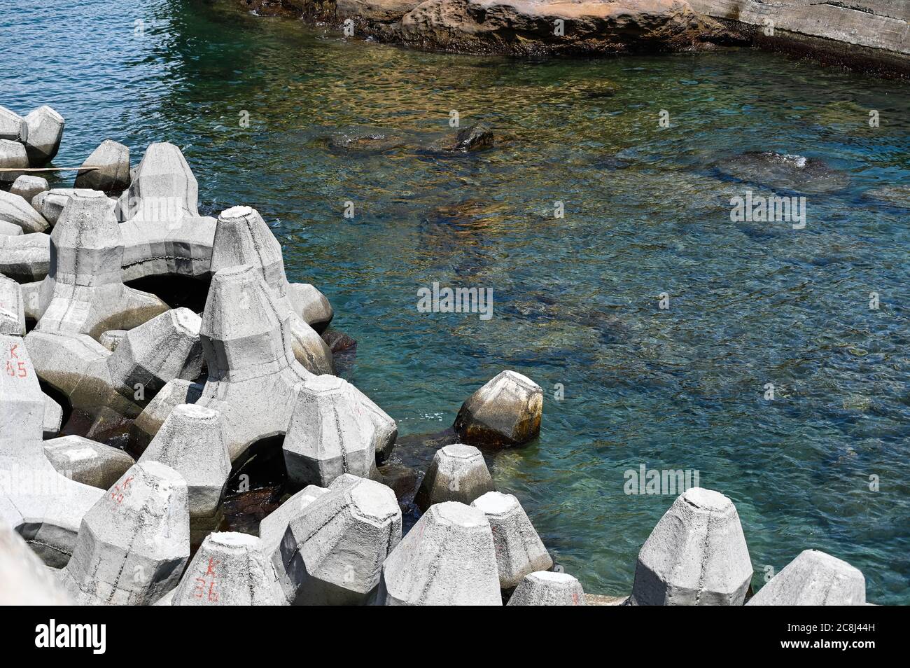 New Taipei, Taiwan - SEP 14, 2019: Wave block at coastal Stock Photo ...