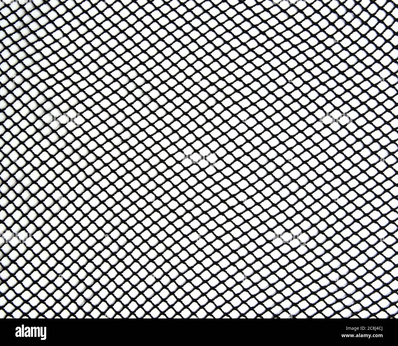 Mesh background made of black fabric stretched over white Stock Photo ...