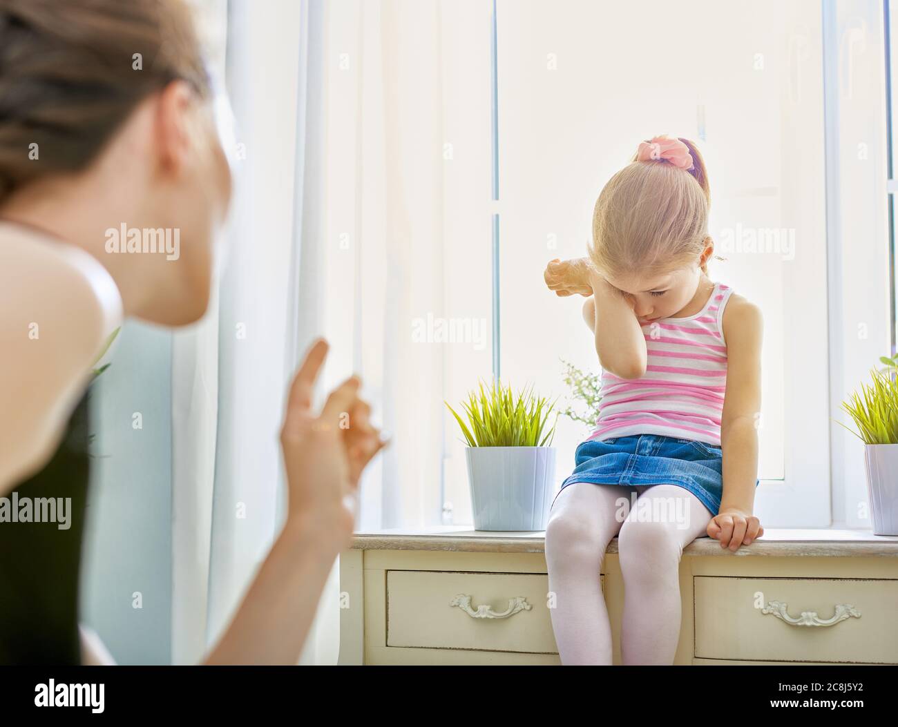 mother scolds her child Stock Photo - Alamy