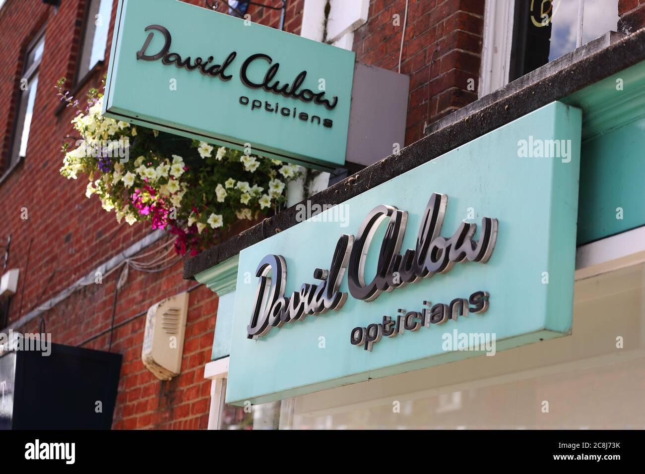 Signs above the David Clulow opticians outlet in Marlow, UK Stock Photo ...