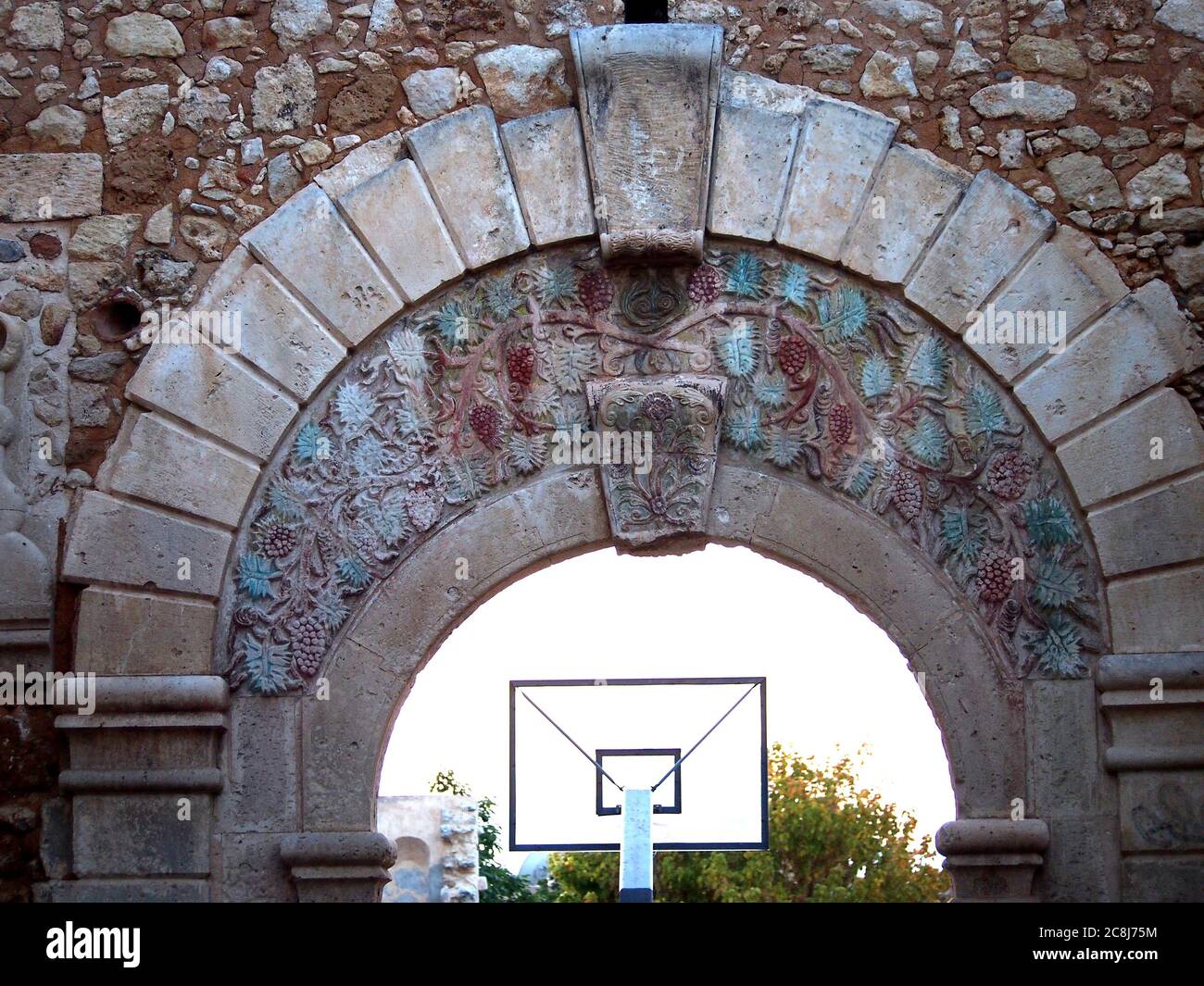 Arch and basketball hoop, Rethimno, Crete Stock Photo - Alamy