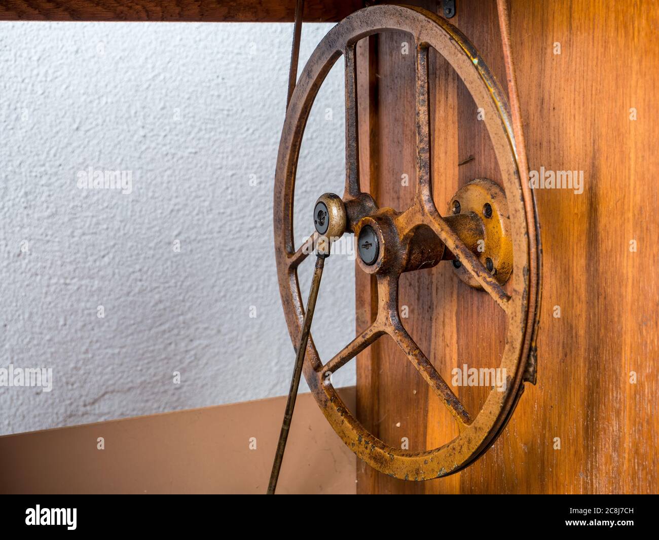 Close up detail with a iron treadle base sewing machine Stock Photo - Alamy