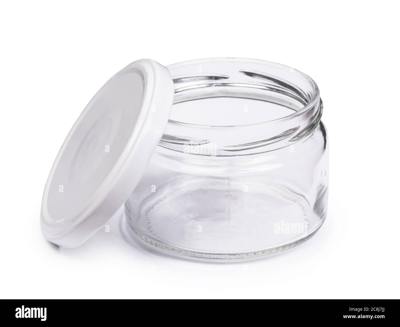 Small empty glass jar with a lid isolated over white background Stock ...