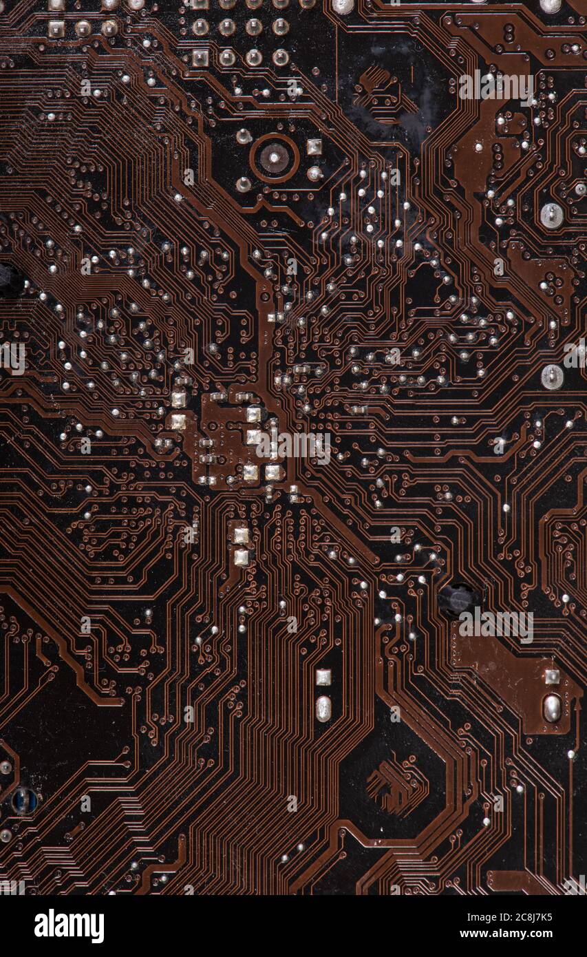 Modern printed brown circuit board, electronic circuit board, textolite ...