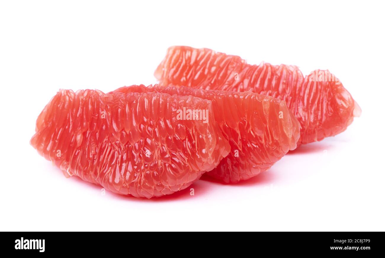 Peeled grapefruit slice on white background Stock Photo - Alamy