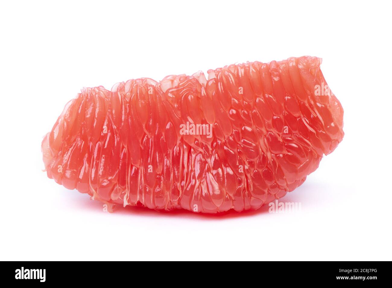 Peeled grapefruit slice on white background Stock Photo - Alamy