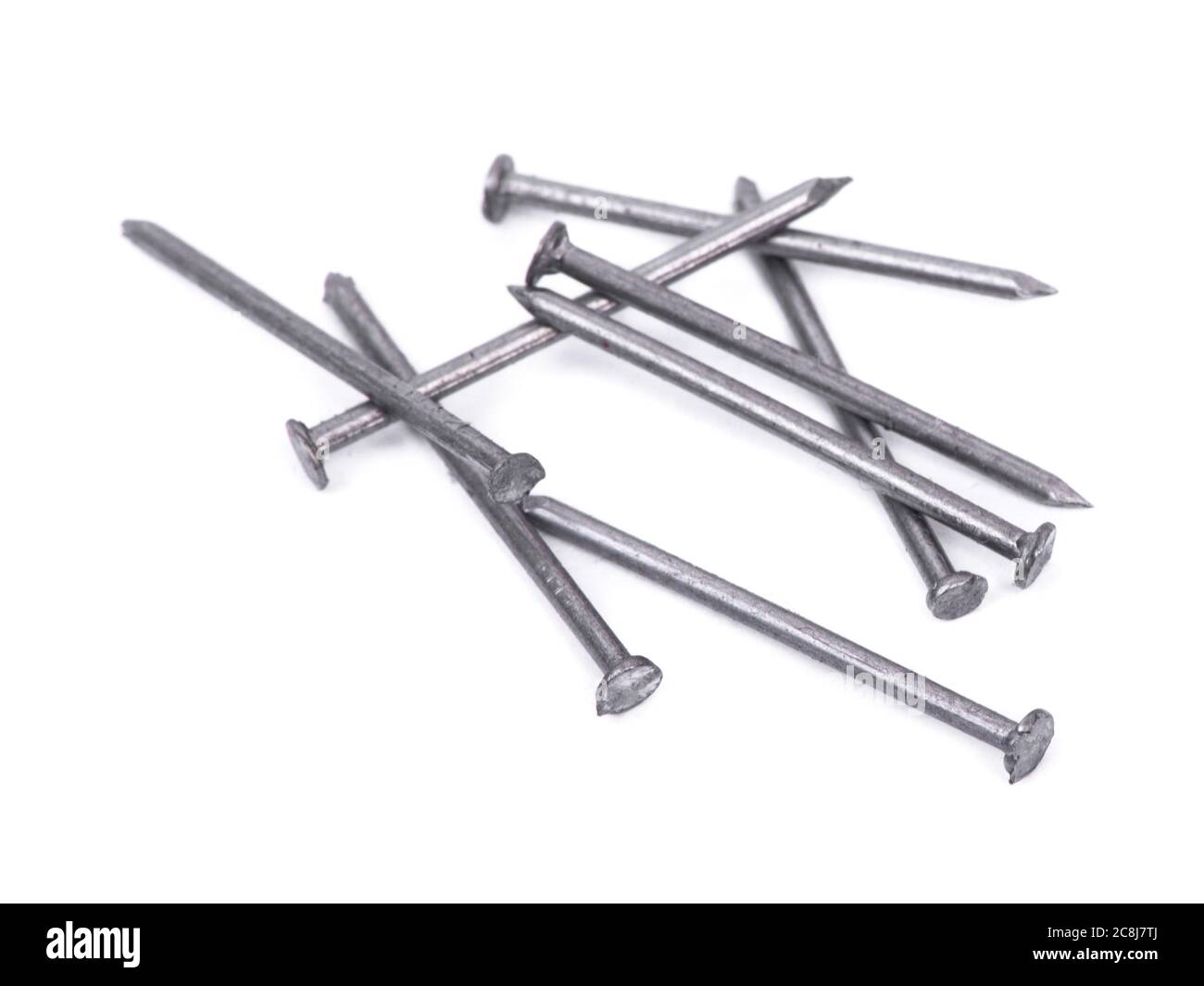 Group of small nails isolated on white background Stock Photo - Alamy