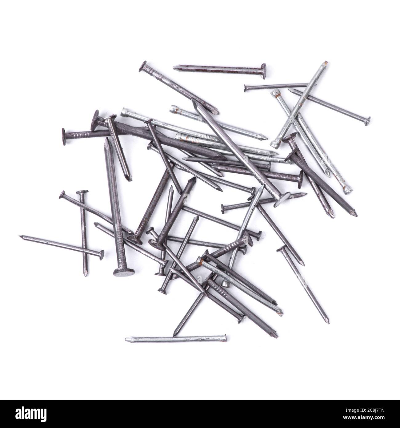 Group of small nails isolated on white background Stock Photo - Alamy