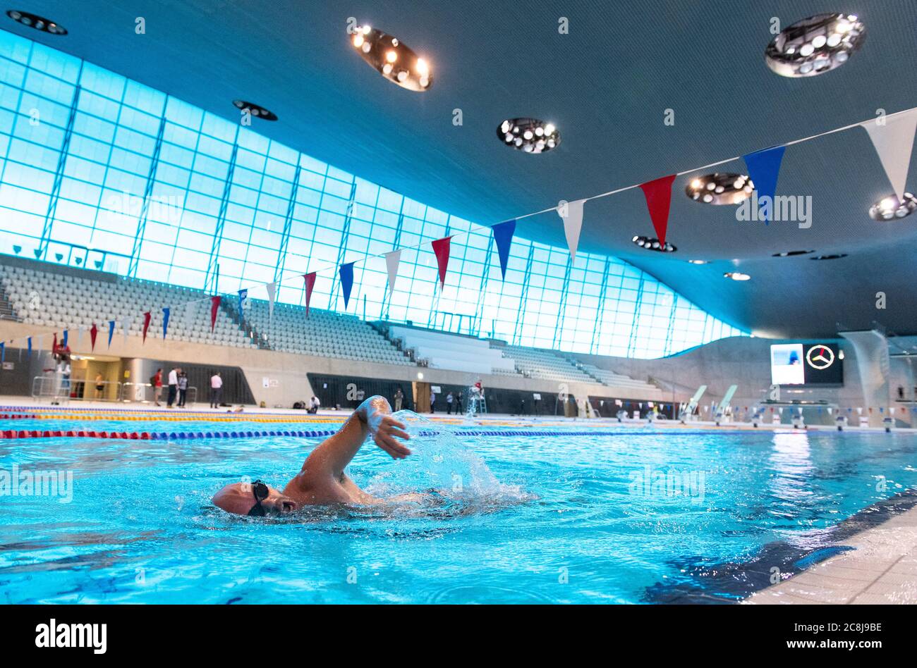 Swimmers at the London Aquatic Centre, at the Queen Elizabeth Olympic ...