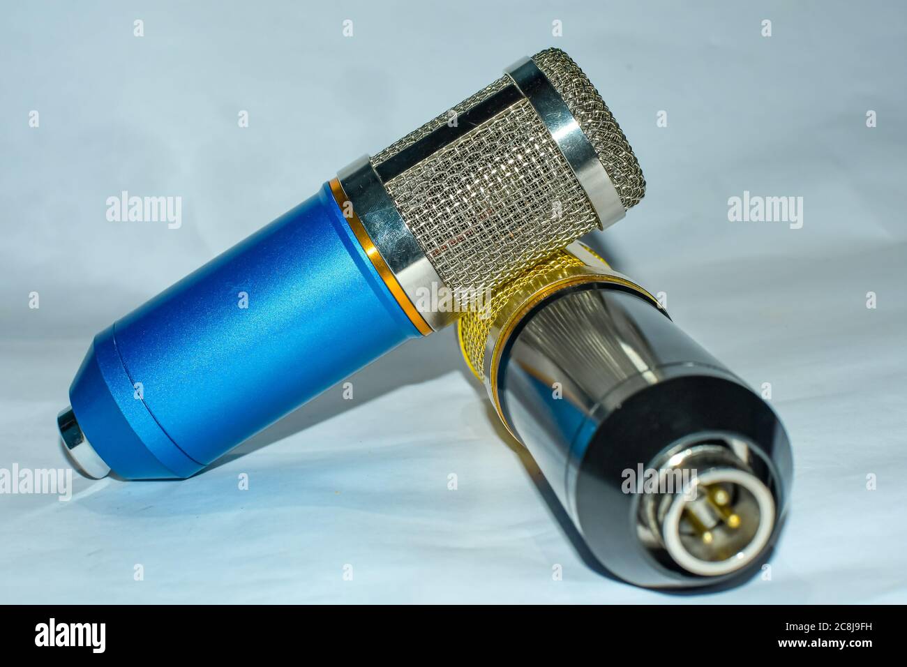 Two Voice microphone on white background Stock Photo - Alamy