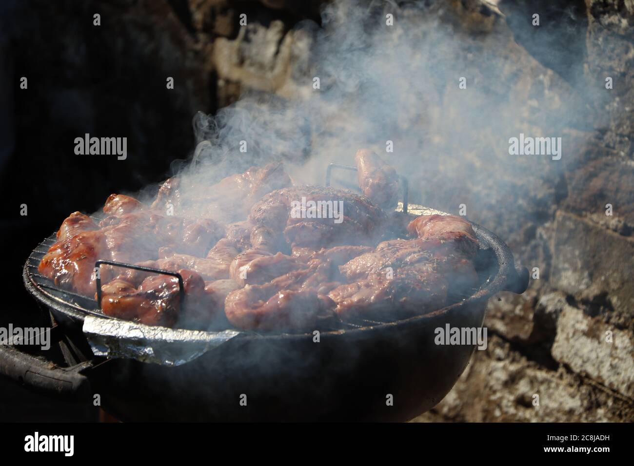 Chicken being cooked hi-res stock photography and images - Alamy