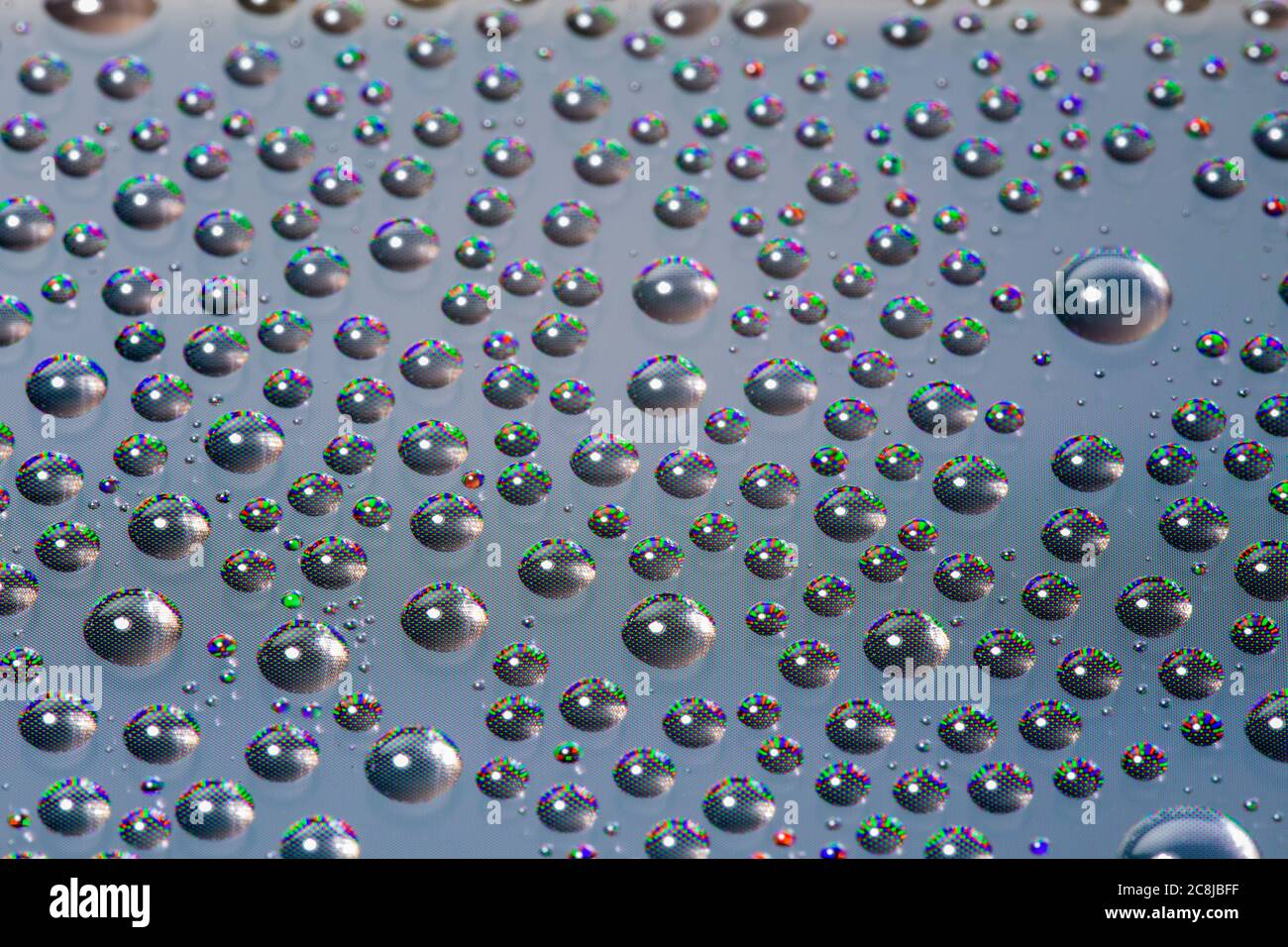 many small water drops on the surface of cellphone hydriphobic coated ...