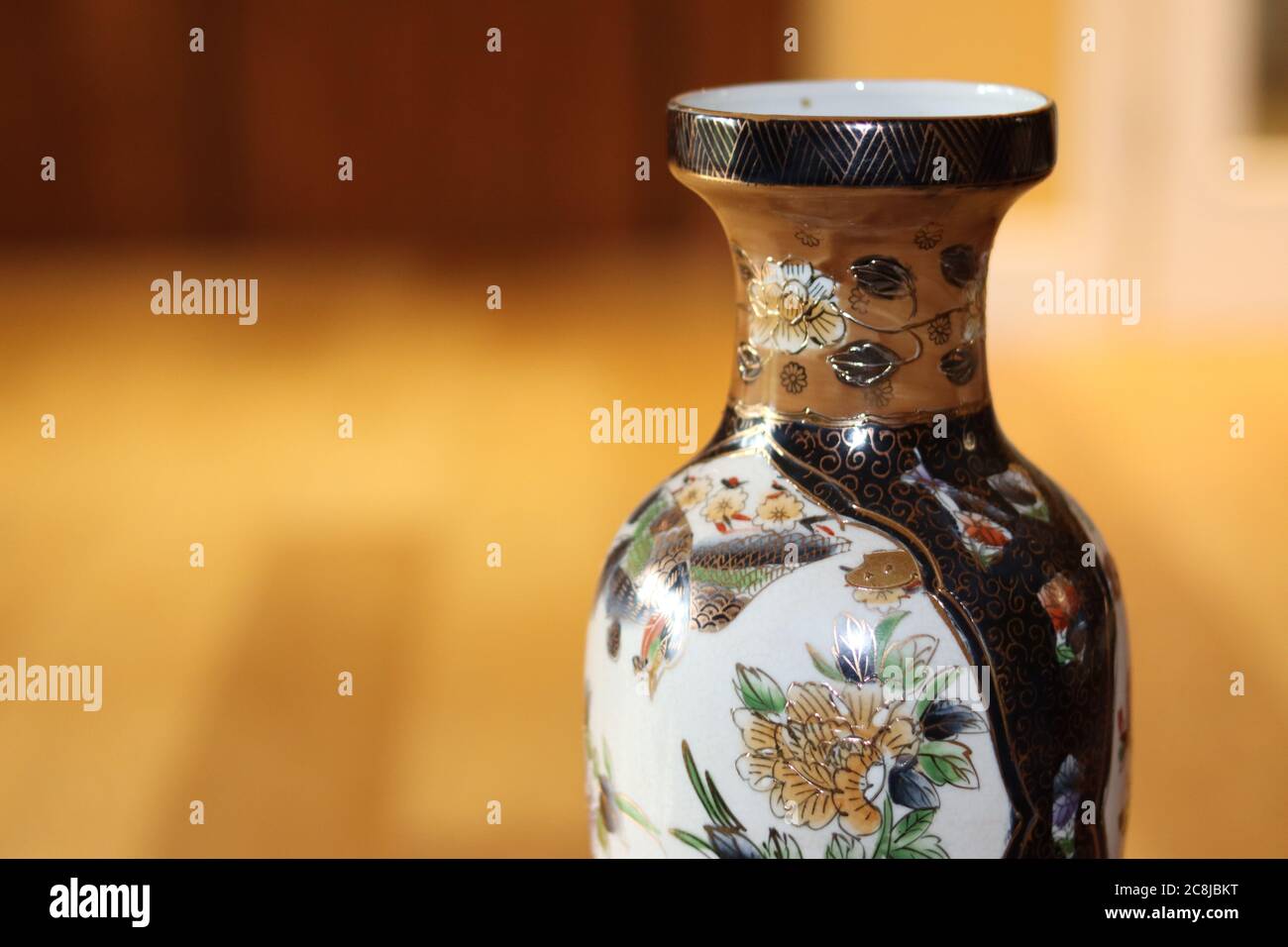 Beautiful vase with patterns and flowers in its design Stock Photo - Alamy