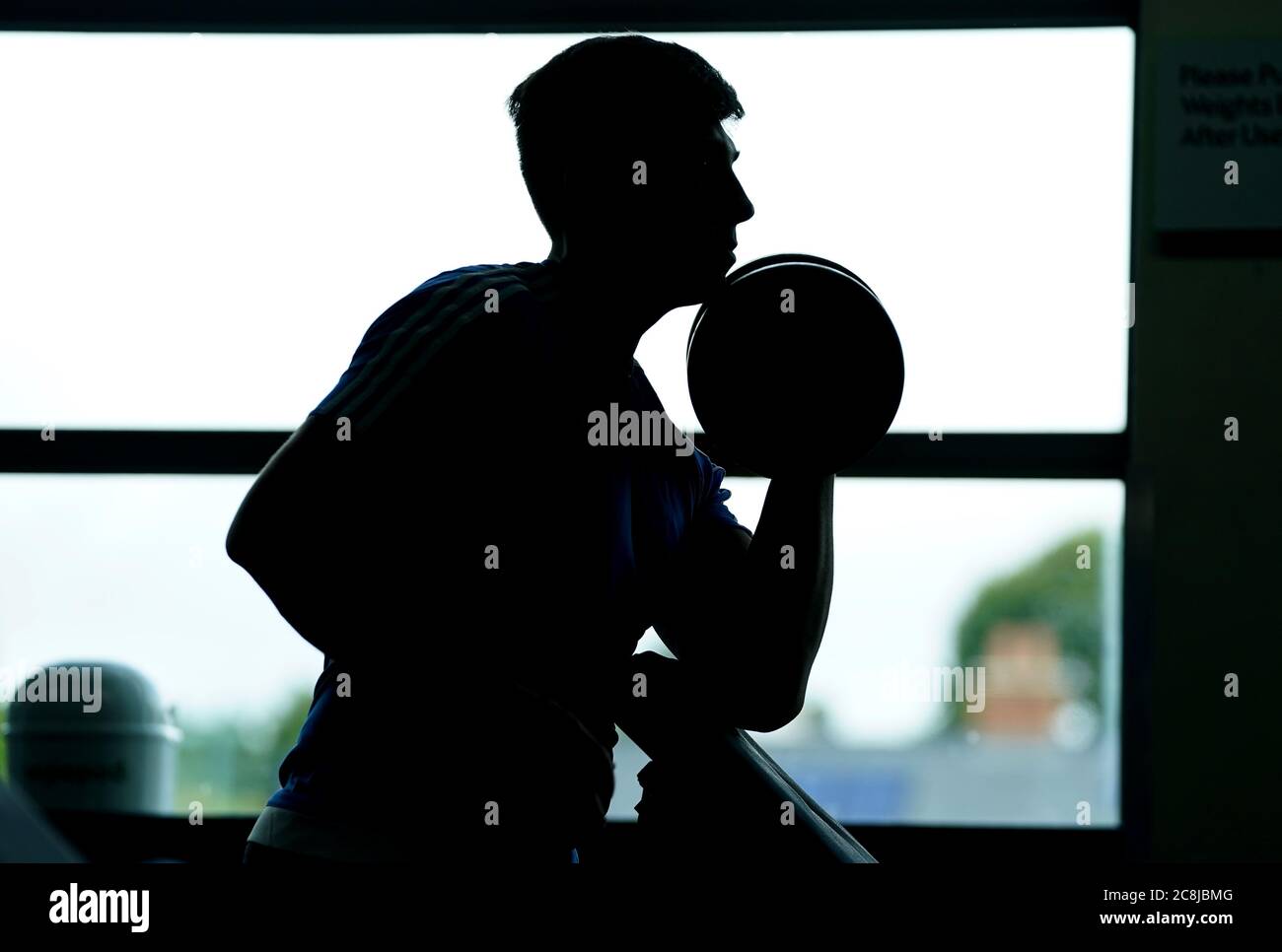 Gym members exercise at Nuffield Health Sunbury gym as indoor gyms ...