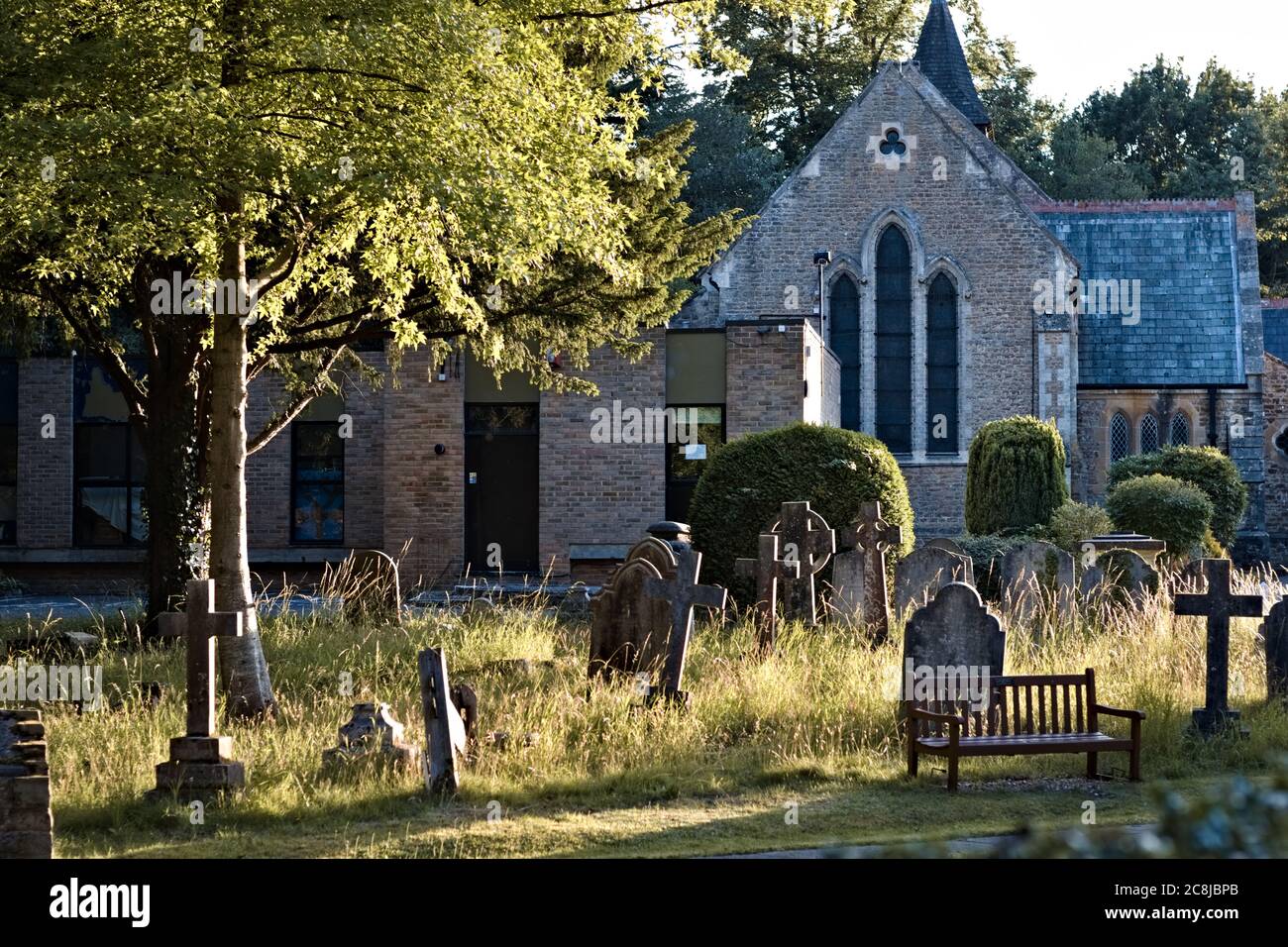 Church and graveyard in the sun Stock Photo - Alamy