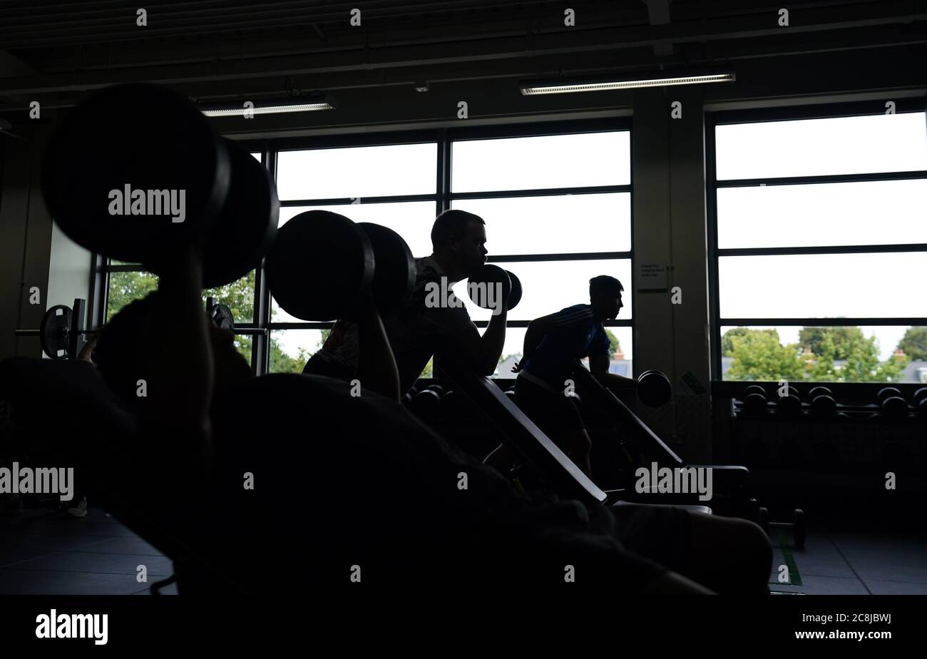 Gym members exercise at Nuffield Health Sunbury gym as indoor gyms ...