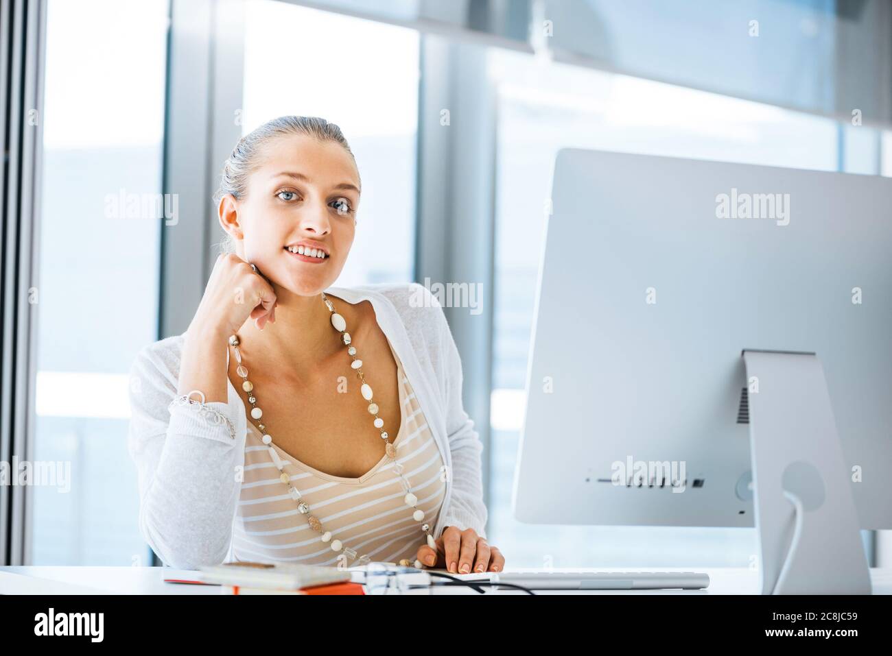 Elegant office worker Stock Photo - Alamy