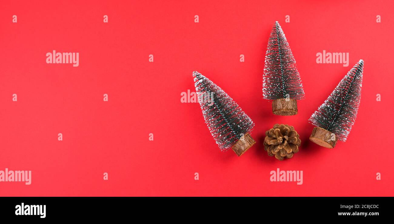 Christmas new year red background with trees Stock Photo - Alamy