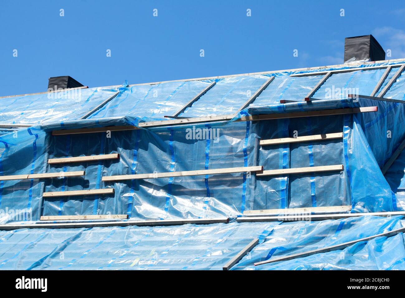 Roof windows, Building site, Roof, Roof renovation, Blue cover Stock ...
