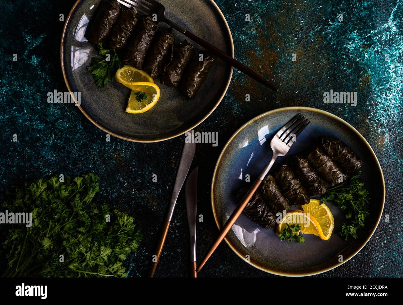 Traditional georgian tolma in vine leaves on rustic background with ...