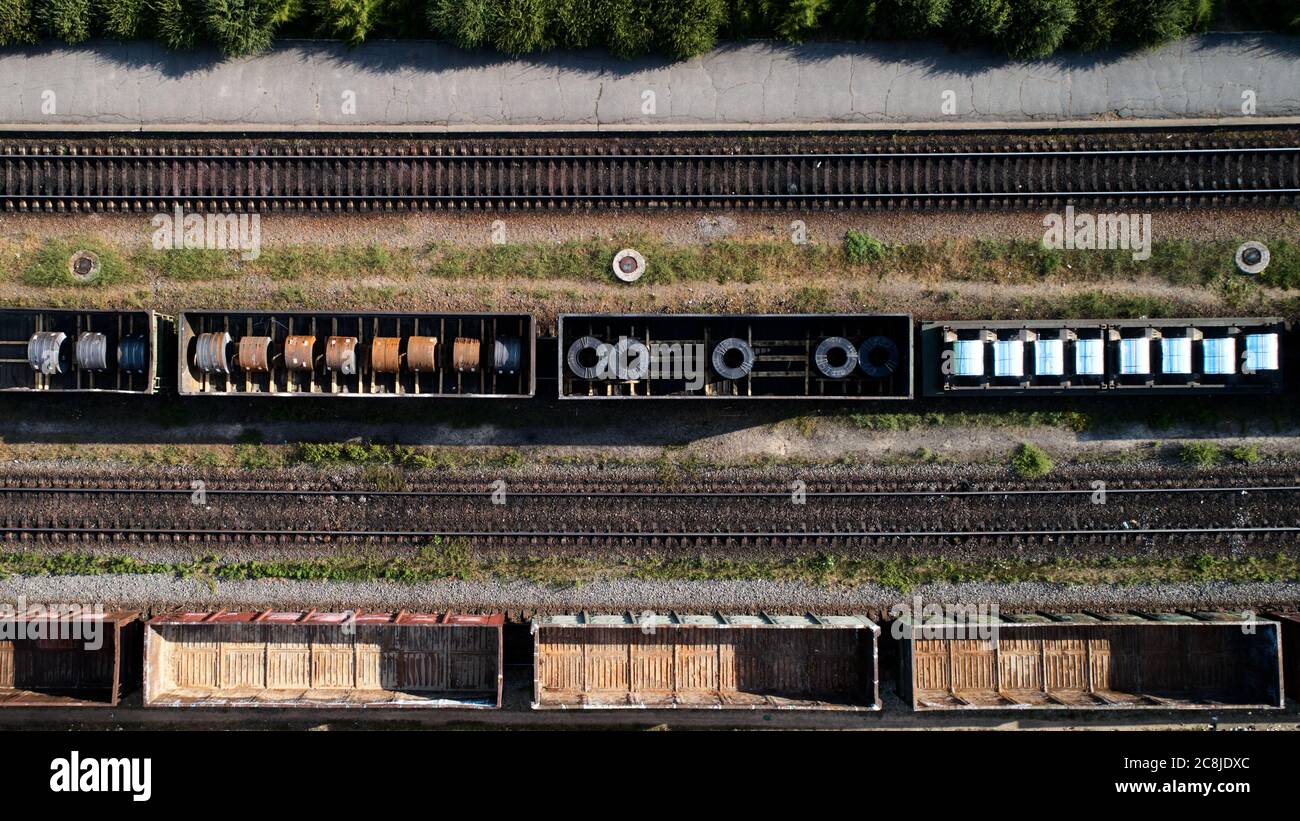 Aerial view of rail sorting freight station with railway cars, with ...