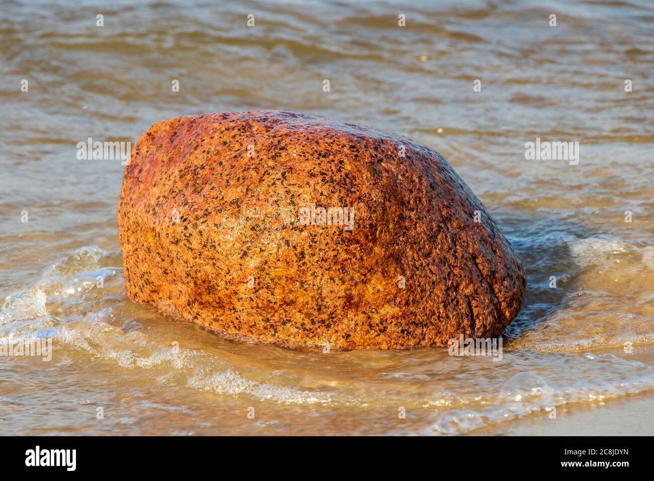 PolzeathBeach-colored stones on an English beach in Cornwall Stock ...