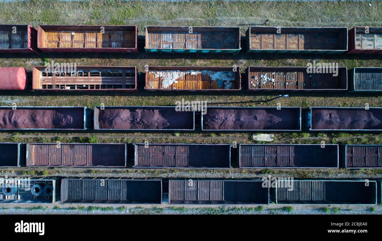 Aerial view of rail sorting freight station with railway cars, with ...