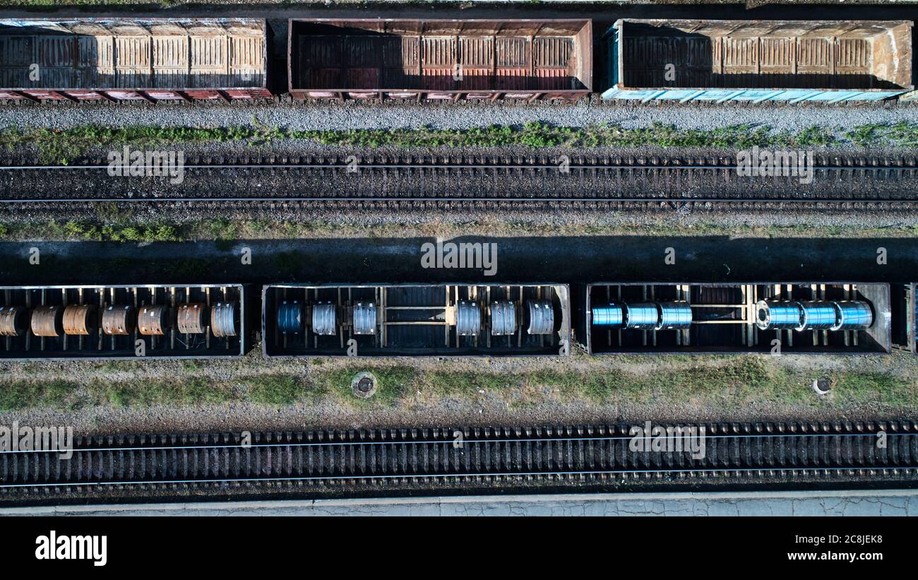 Aerial view of rail sorting freight station with railway cars, with ...