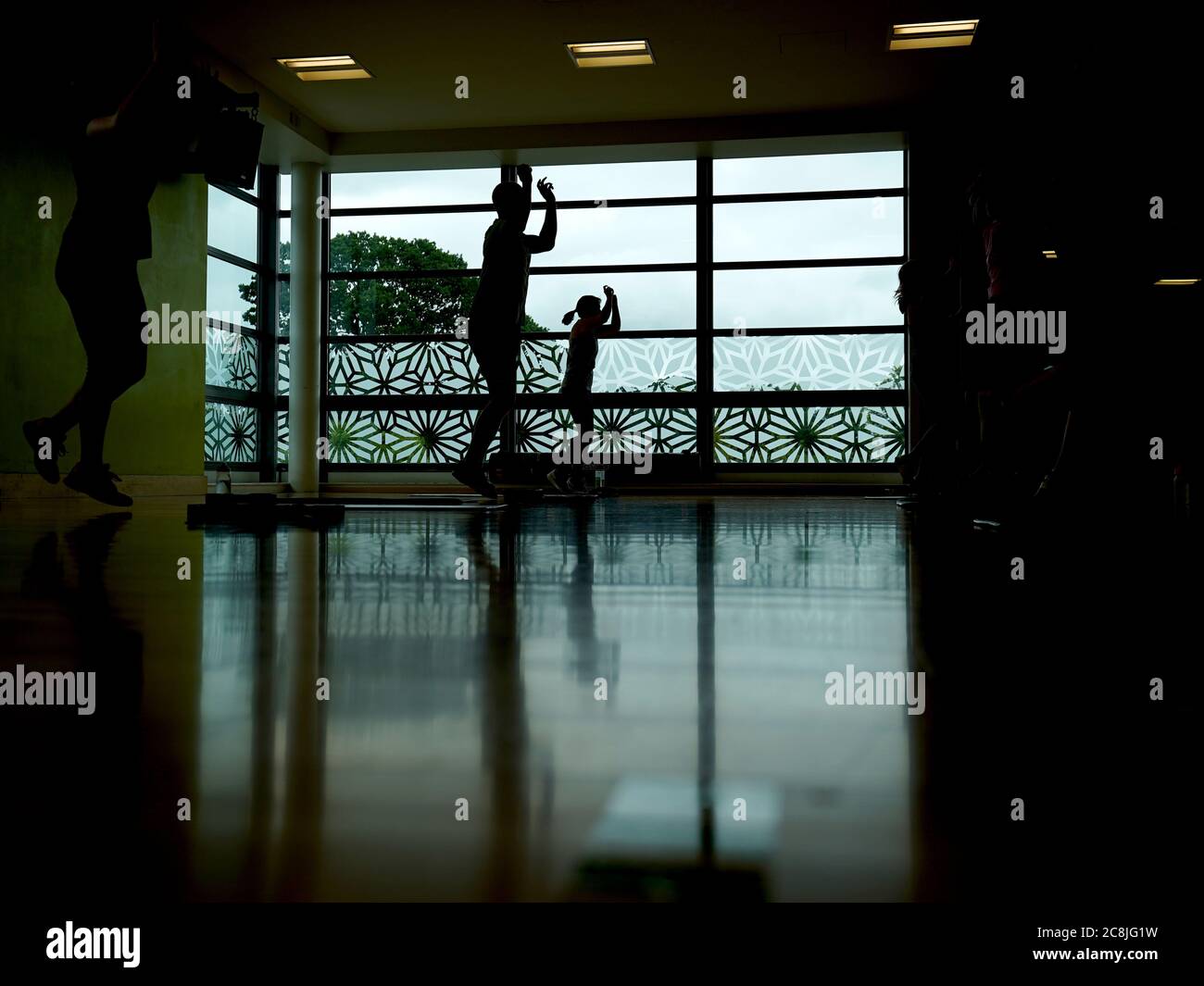 Gym members exercise nuffield health sunbury gym hi-res stock ...