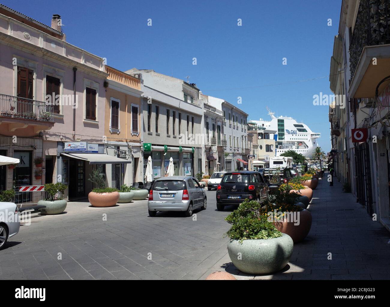 Porto Torres, Sardinia, Italy. The main street and the harbour in the ...