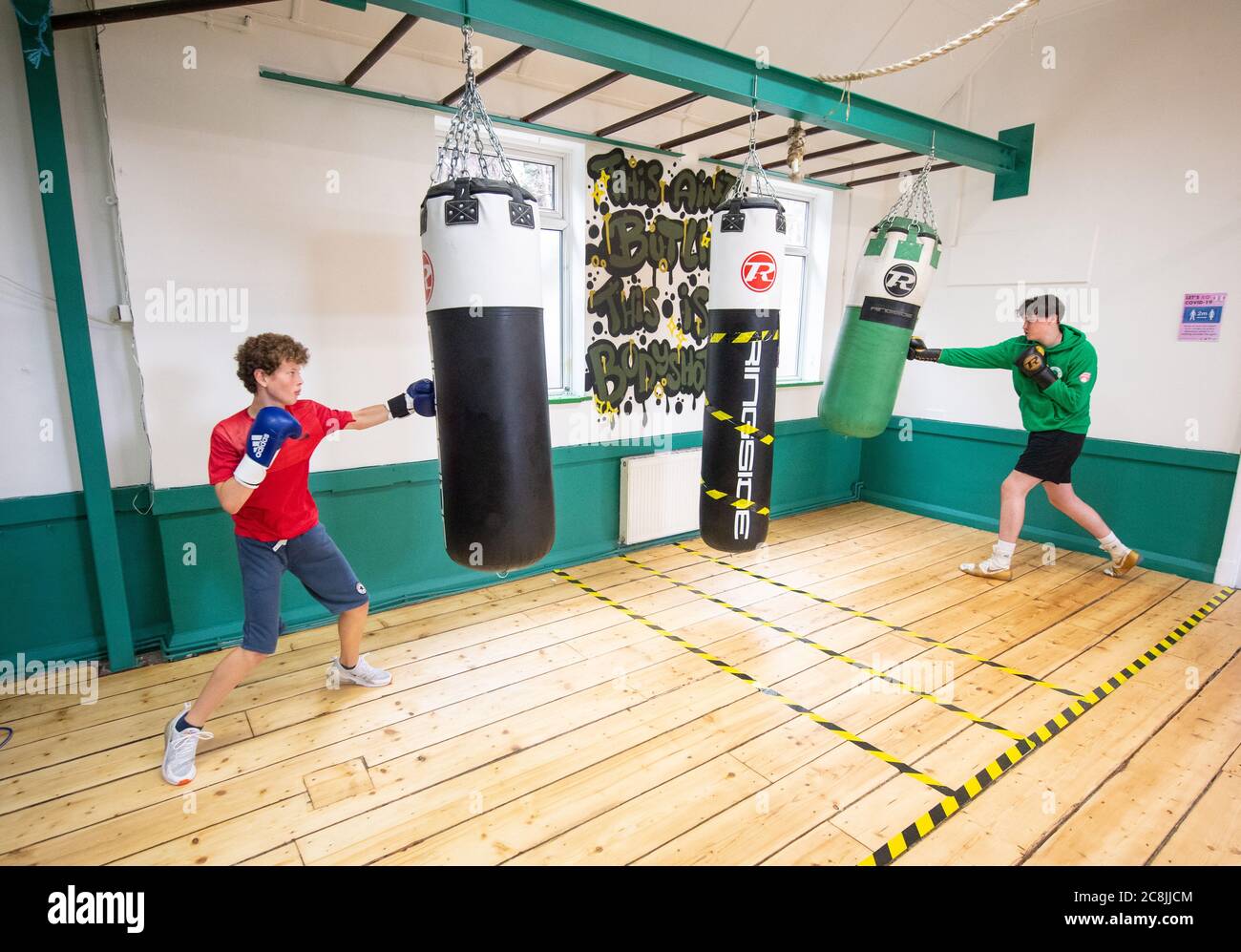 Jack Billings (left) and Harry Fullagar observe social distancing as ...