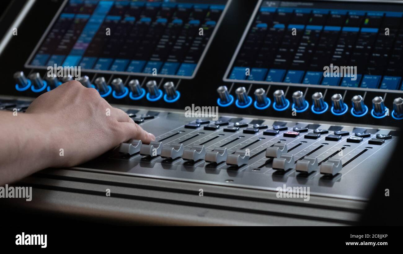 Faders on an Audio desk Stock Photo - Alamy