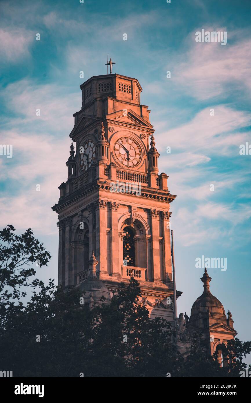 sunlight hitting the clock tower of Portsmouth Guildhall Stock Photo ...