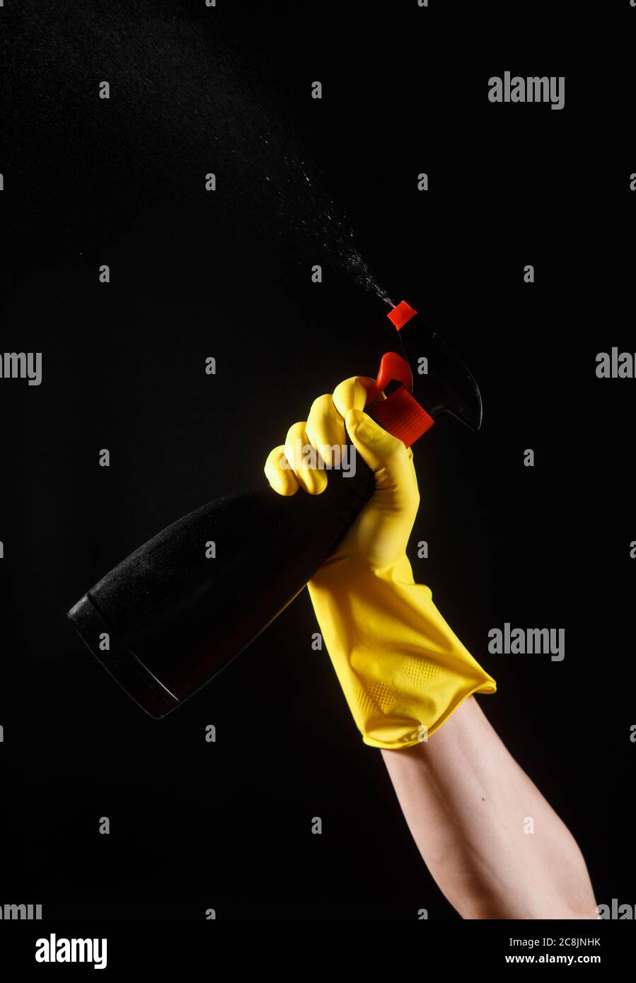cleaning products, black wiper in hands with yellow rubber gloves Stock ...