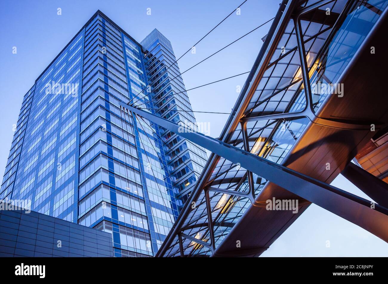 Modern glass bridge between business centers in the central part of the ...