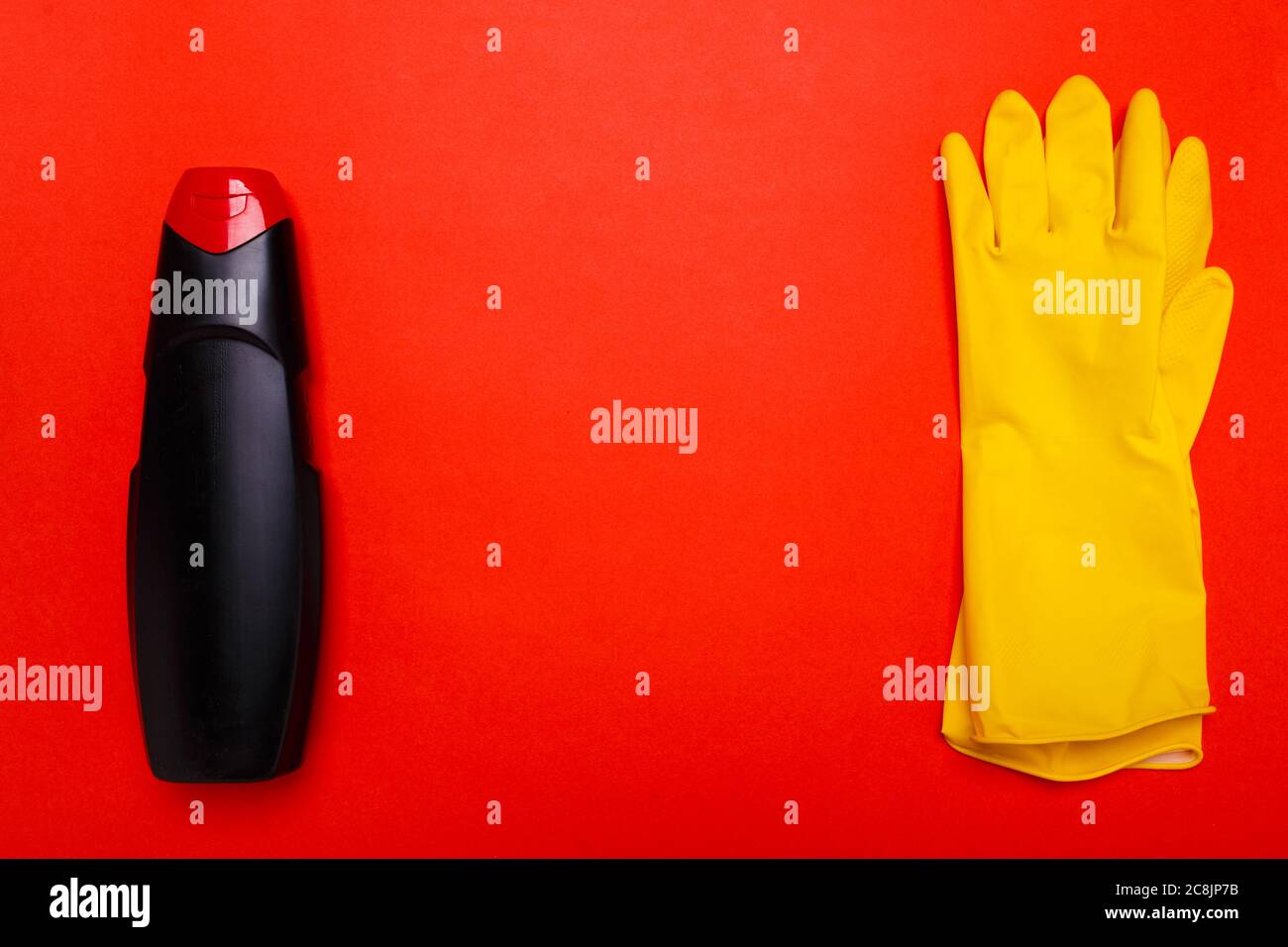 rust remover and gloves on a red background. copyspace Stock Photo - Alamy