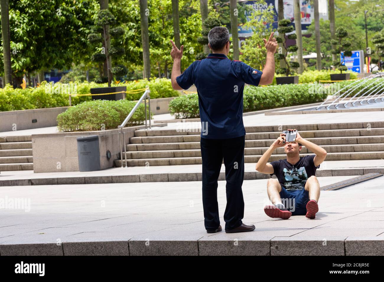 KUALA LUMPUR, MALAYSIA - FEBRUARY 20, 2017 - Tourist man taking picture ...