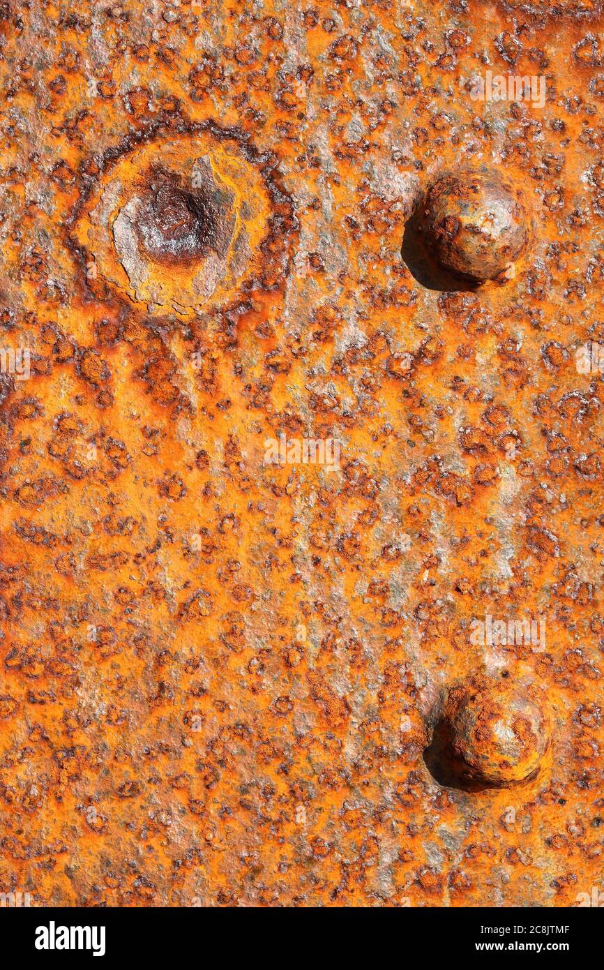 Rusty background texture close up of old distressed weathered iron ...